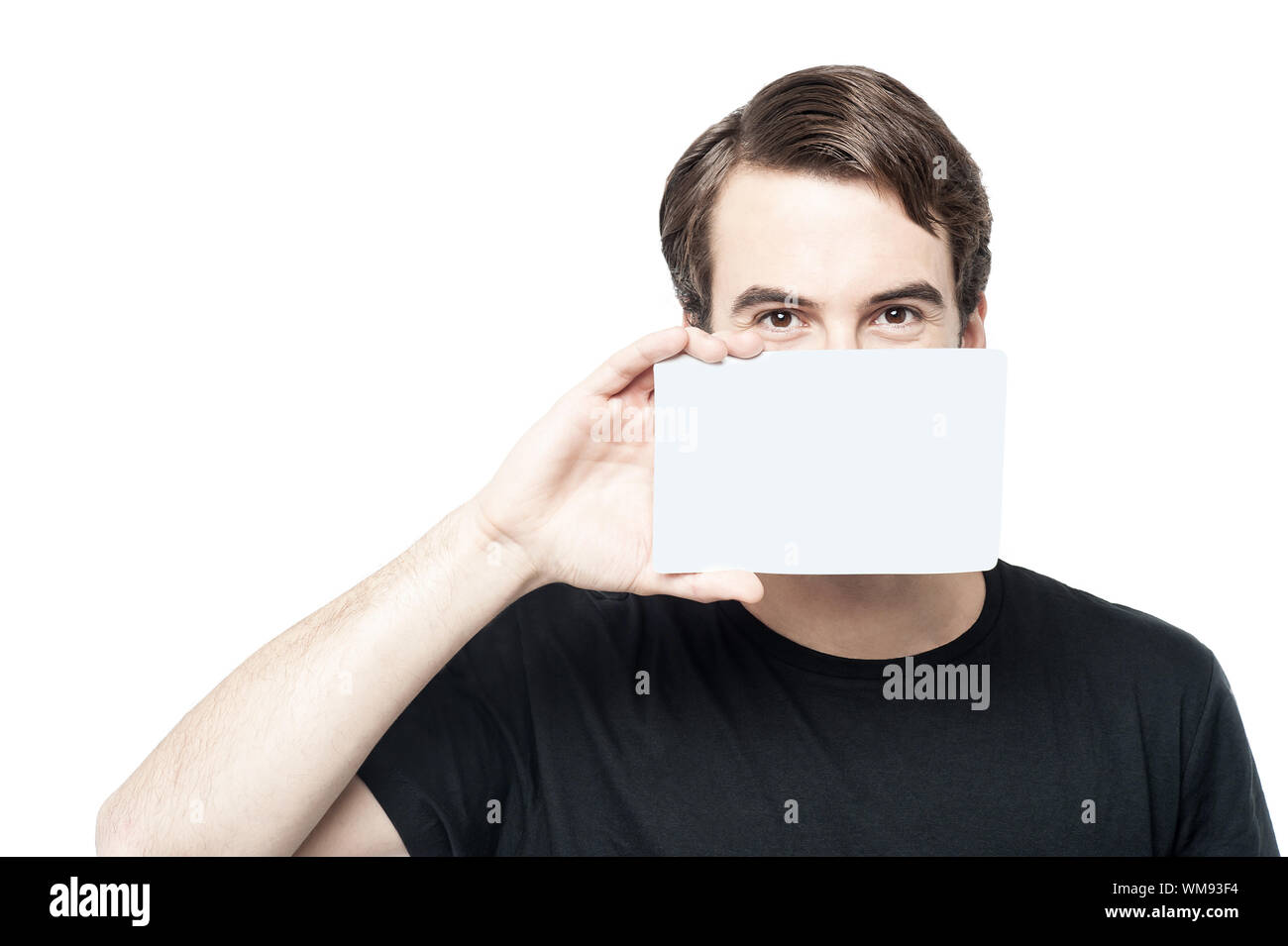 Young man cover his face with business card Stock Photo - Alamy