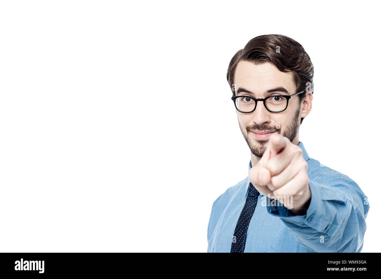 Young man beard pointing camera Cut Out Stock Images & Pictures - Alamy