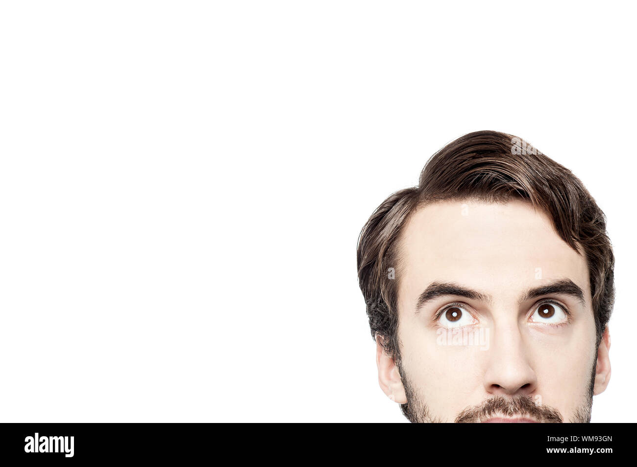 Close up of man face with his eyes looking up Stock Photo - Alamy