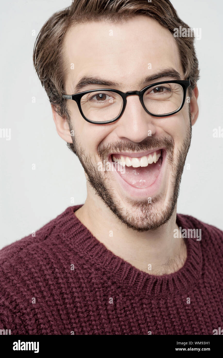 Closeup image of a casual man giving wide smile Stock Photo - Alamy