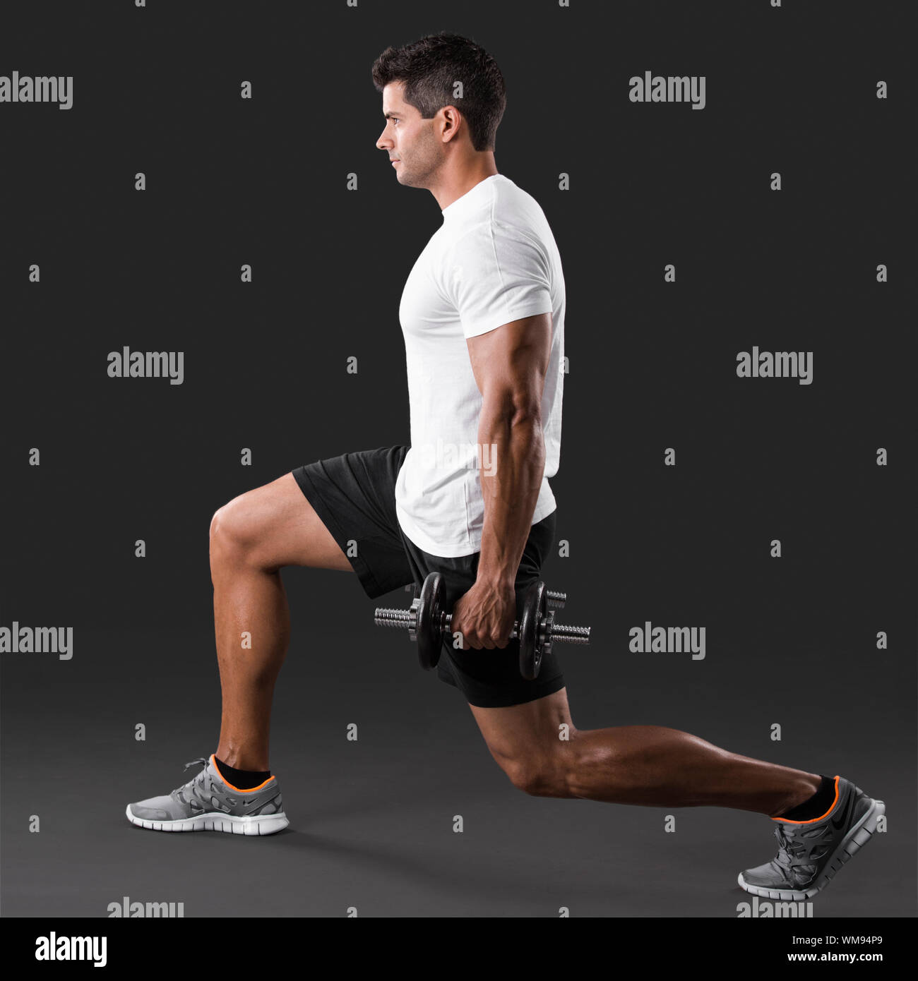 Side view of man lifting arm hi-res stock photography and images - Alamy