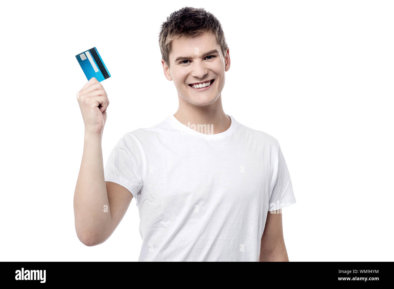 Casual man displaying his new debit card to camera Stock Photo - Alamy