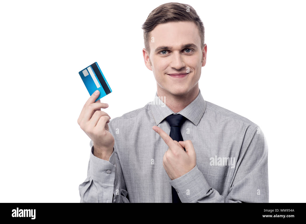Young businessman displaying his debit card Stock Photo - Alamy