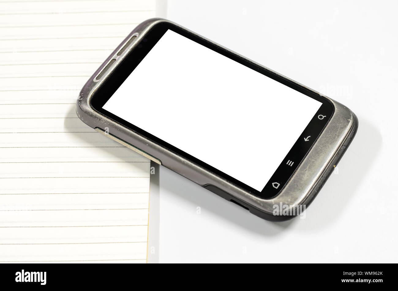 smartphone with note book on a white background Stock Photo - Alamy