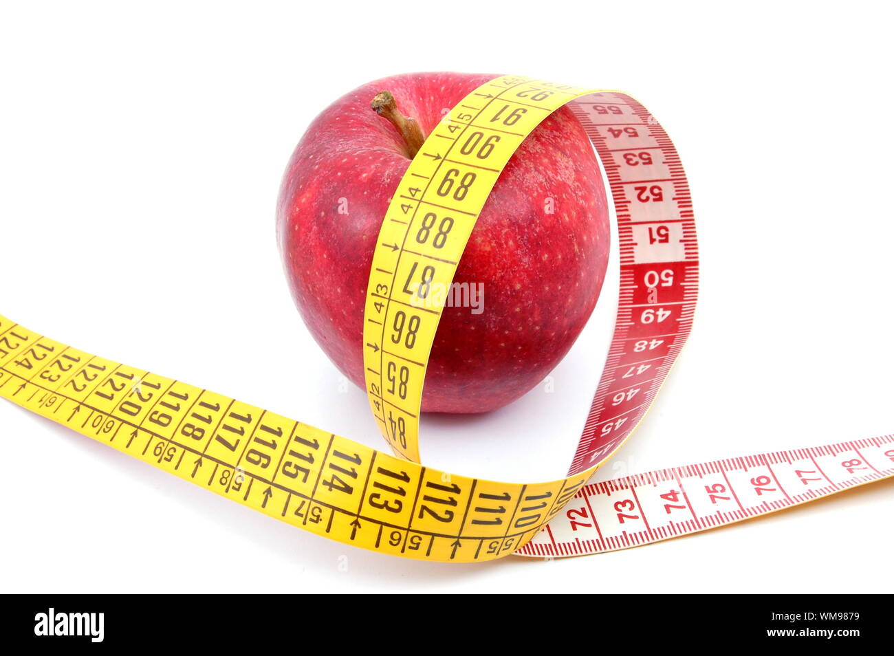 apple and measuring tape isolated on white background Stock Photo - Alamy