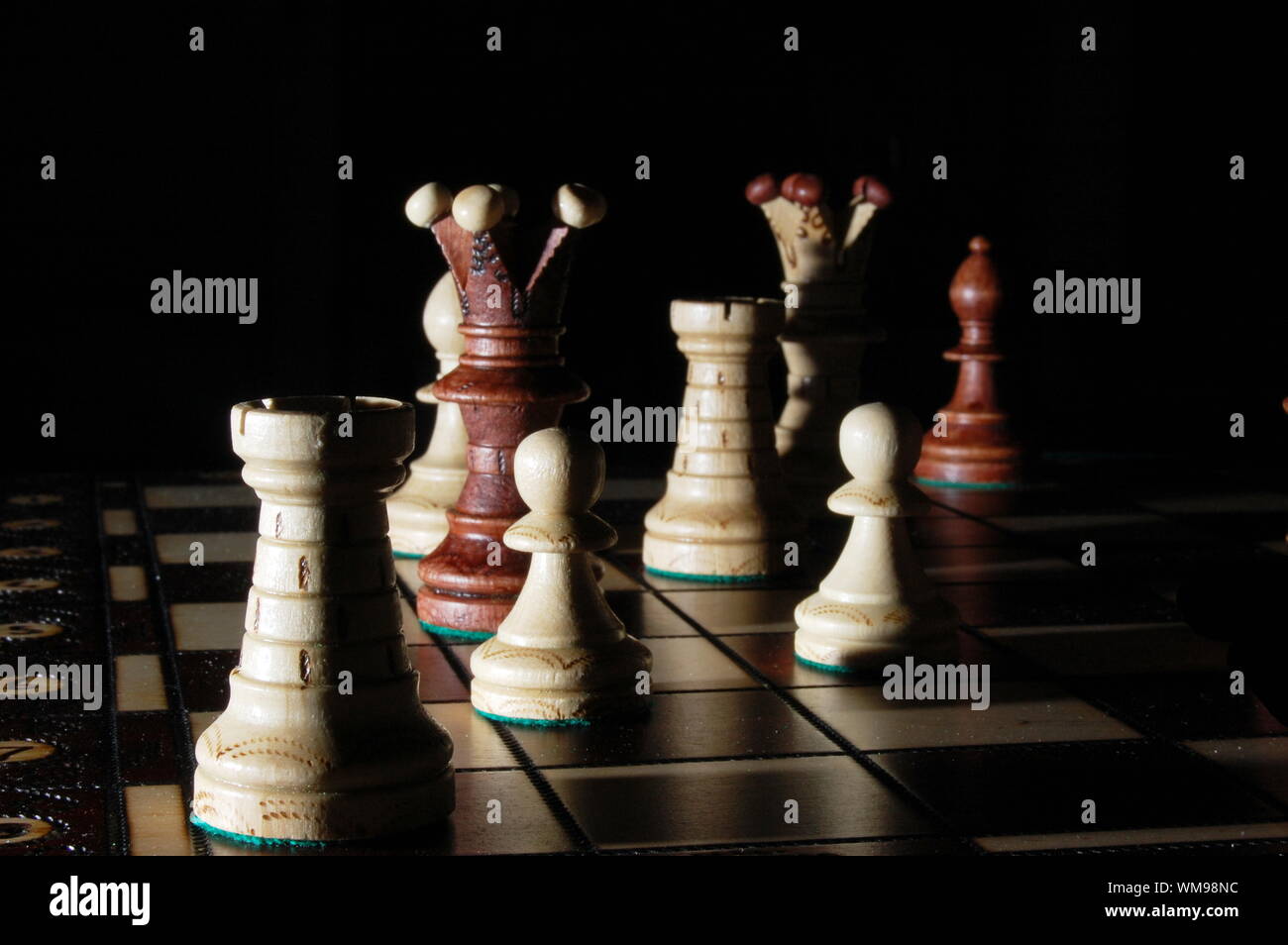 chess pieces on chess board showing power and success Stock Photo - Alamy