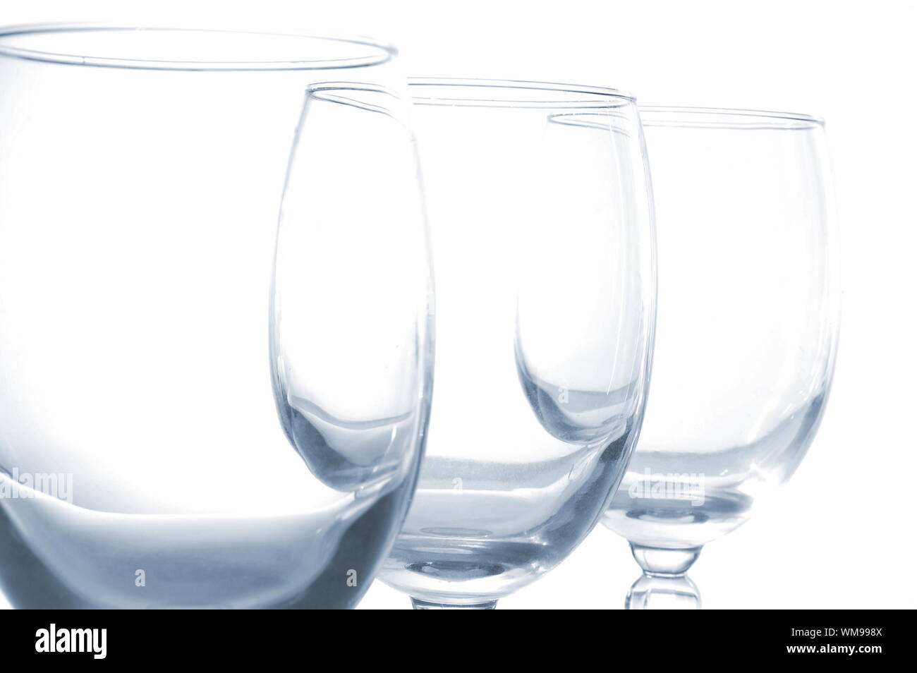 empty vine glasses isolated on white background Stock Photo - Alamy