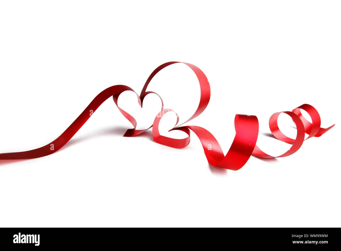 Heart shaped red ribbon isolated on white background Stock Photo - Alamy