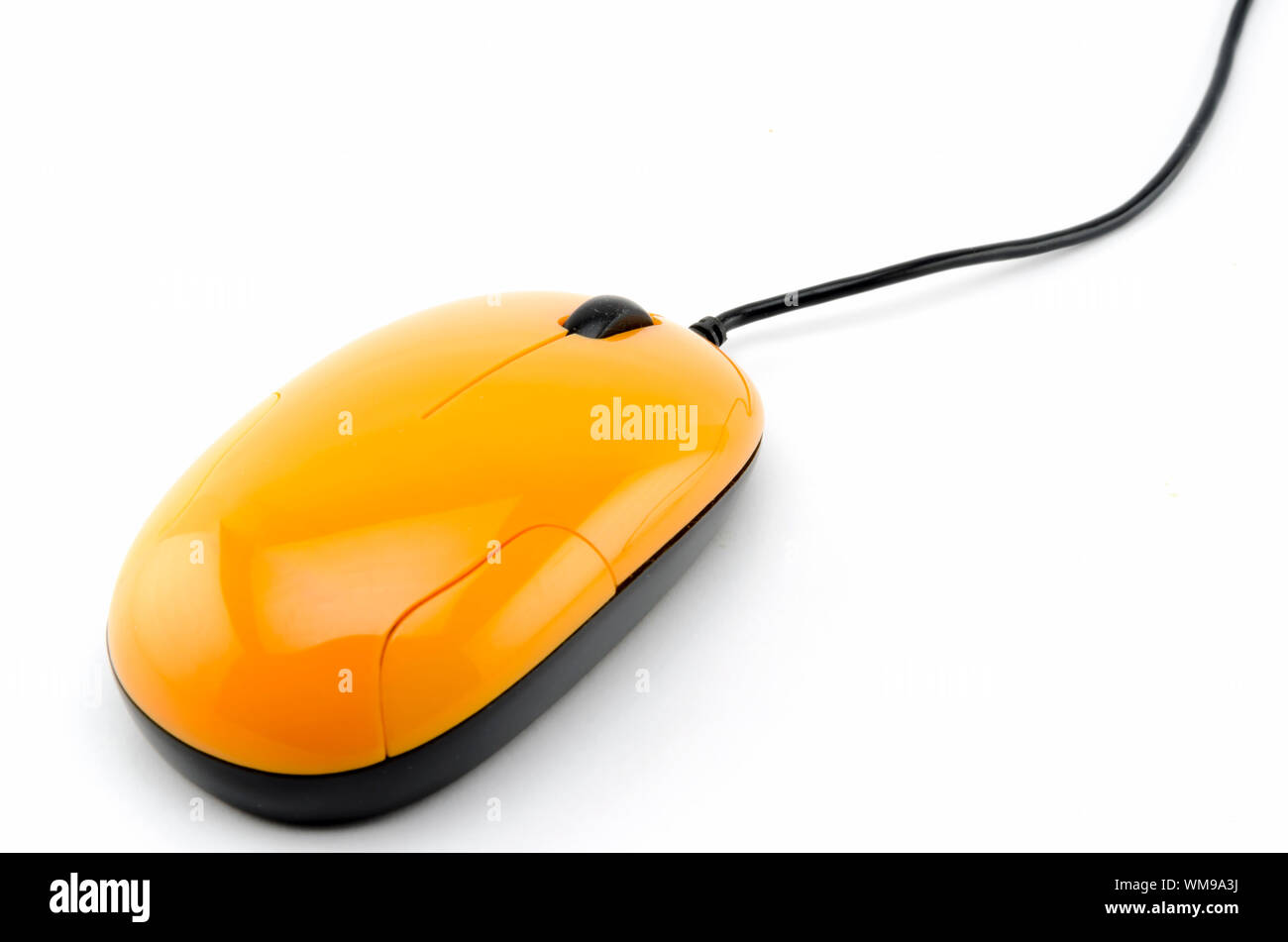 orange computer mouse isolated on white background Stock Photo - Alamy