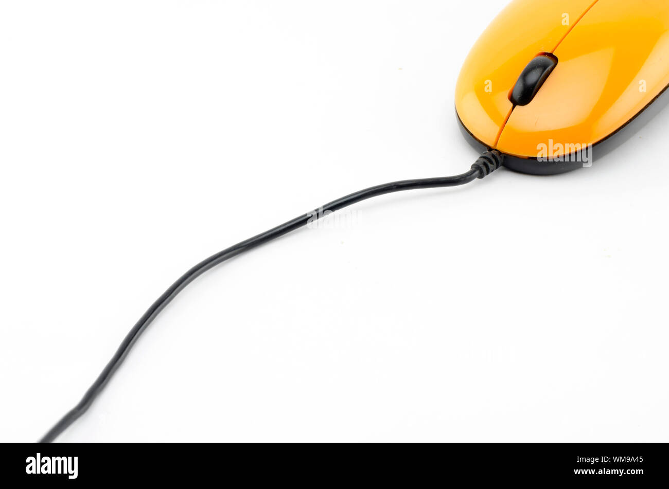 orange computer mouse isolated on white background Stock Photo - Alamy