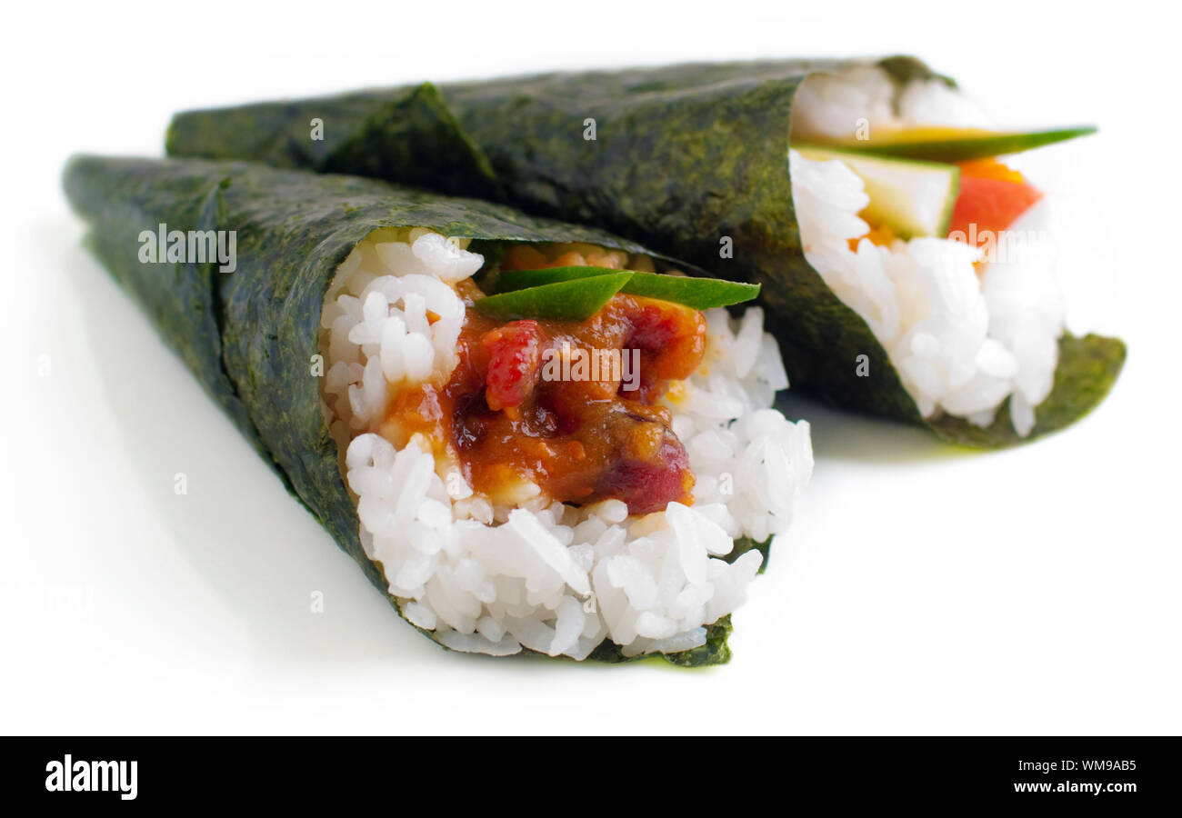 Hand rolled temaki sushi traditional japanese cuisine isolated on white ...