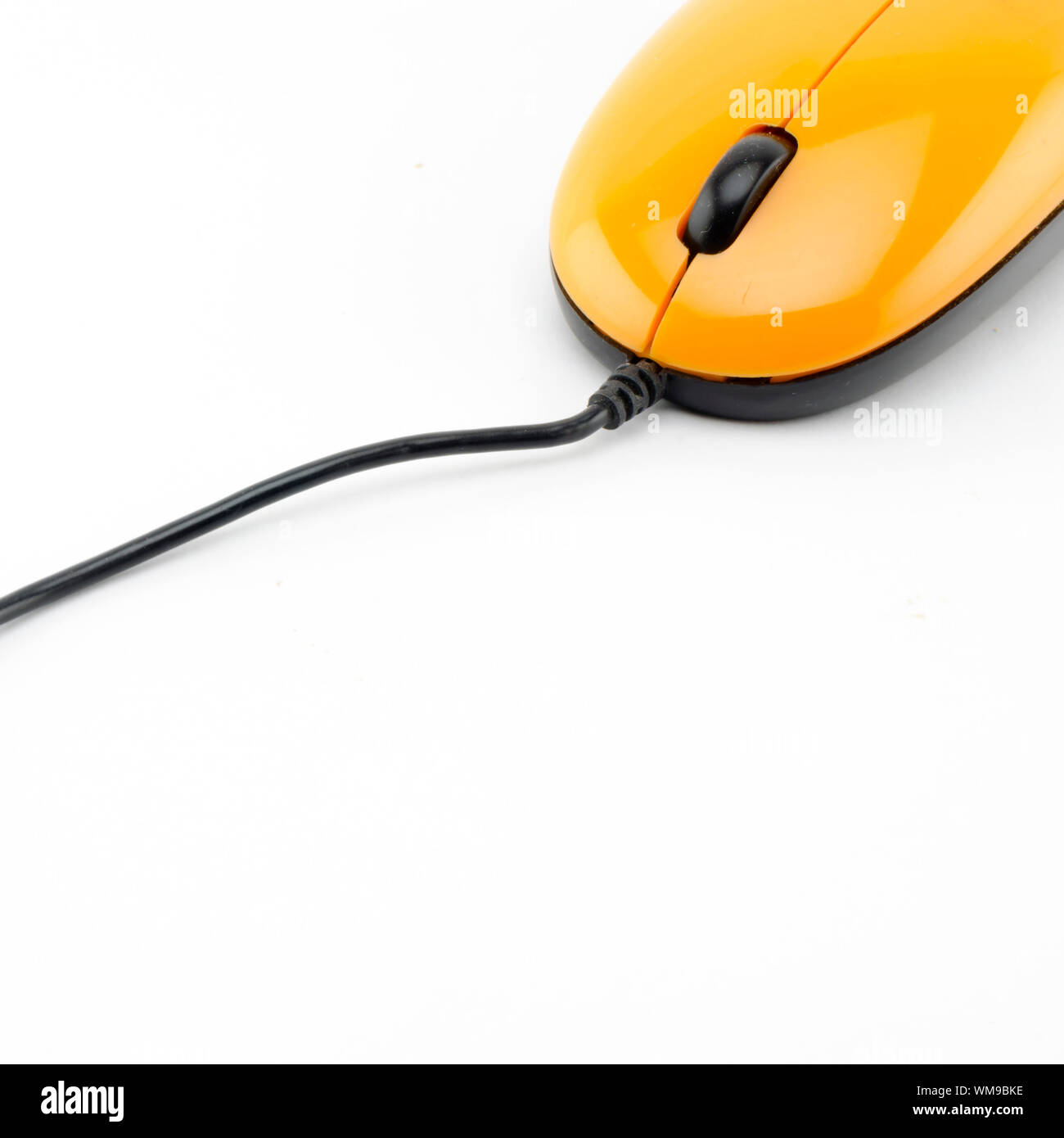 orange computer mouse isolated on white background Stock Photo - Alamy