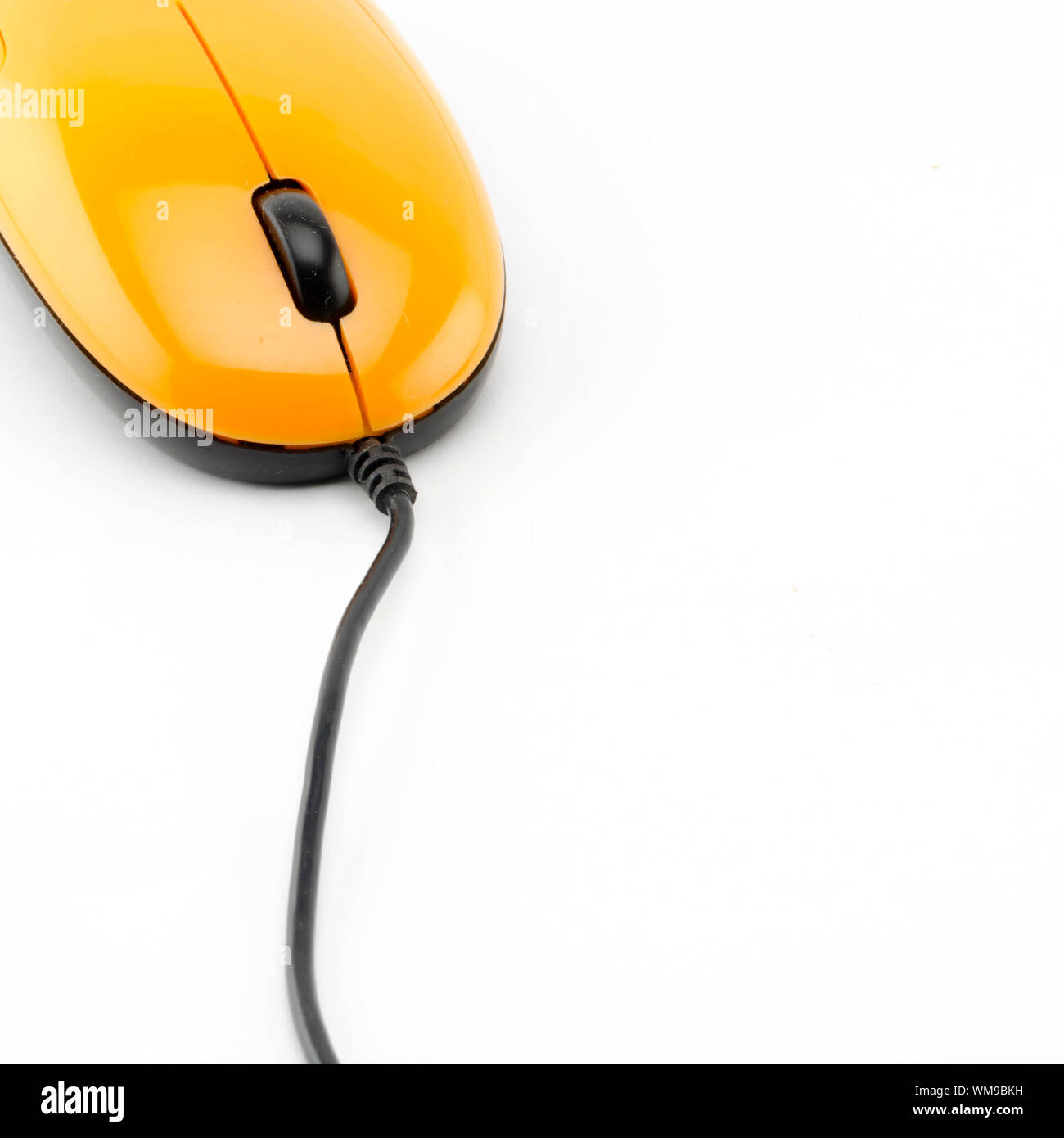 orange computer mouse isolated on white background Stock Photo - Alamy
