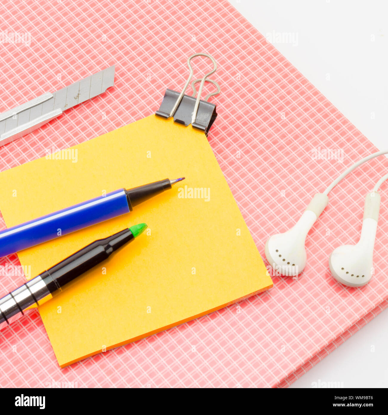 sticky note with supplies isolated on white background Stock Photo - Alamy
