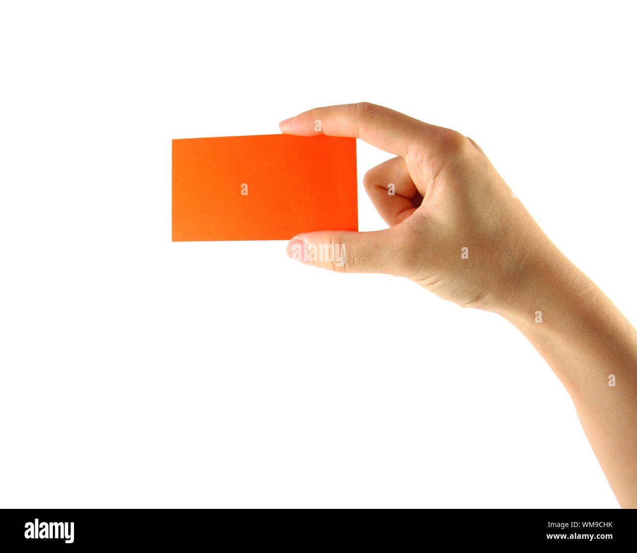 Woman's hand and orange card isolated on white Stock Photo - Alamy