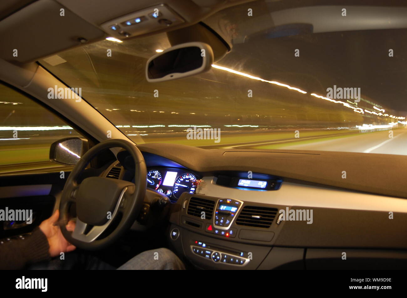 speed car at night in motion with traffic Stock Photo - Alamy