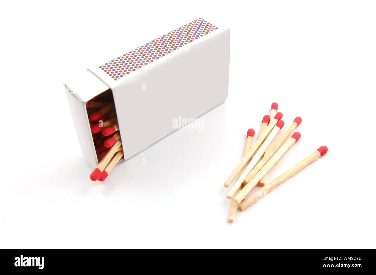 Some red matches isolated on a white background Stock Photo - Alamy