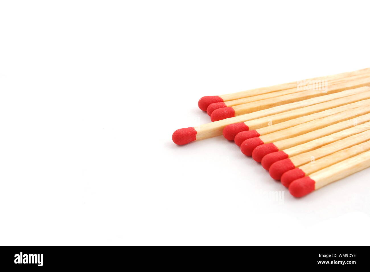 Some red matches isolated on a white background Stock Photo - Alamy