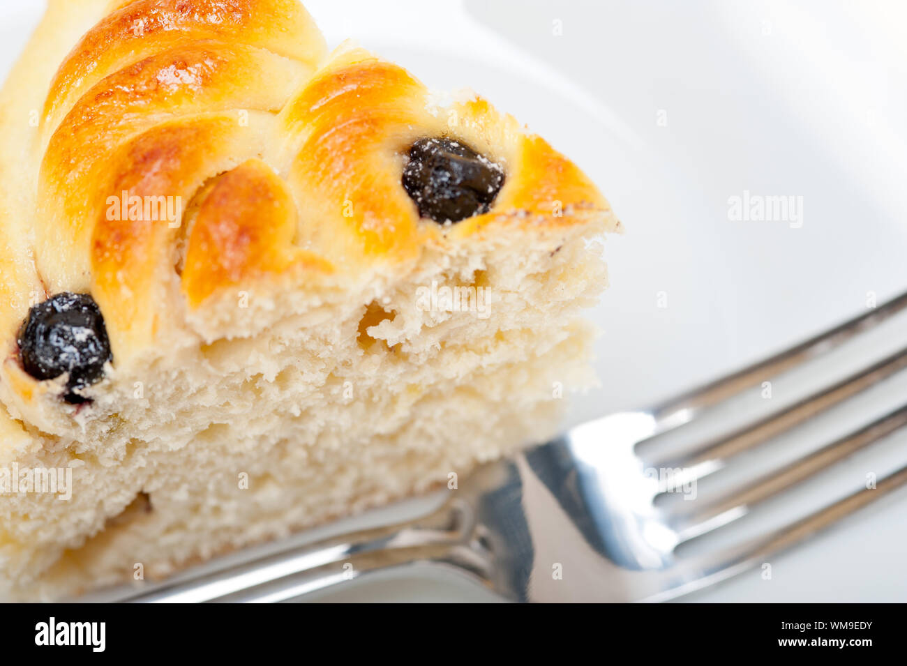 fresh home baked blueberry bread cake dessert over white wood table ...