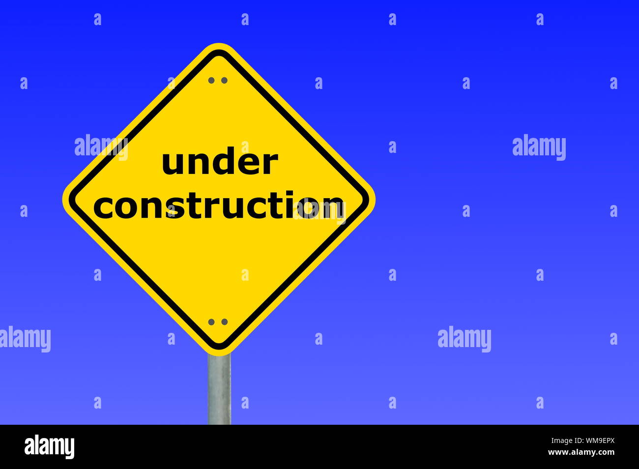 under construction sign and copyspace for a text message Stock Photo ...