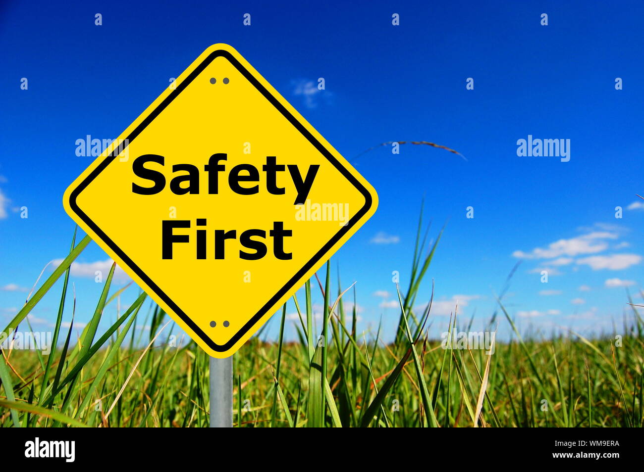 safety first sign and copyspace for text message Stock Photo - Alamy