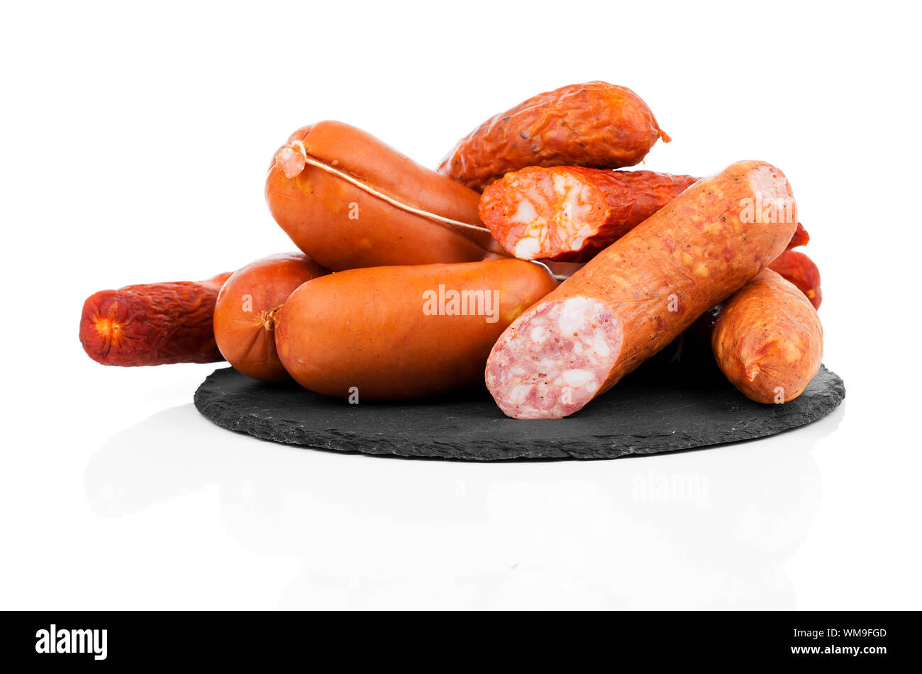 Smoked sausage on a string. Isolated on white background Stock Photo ...