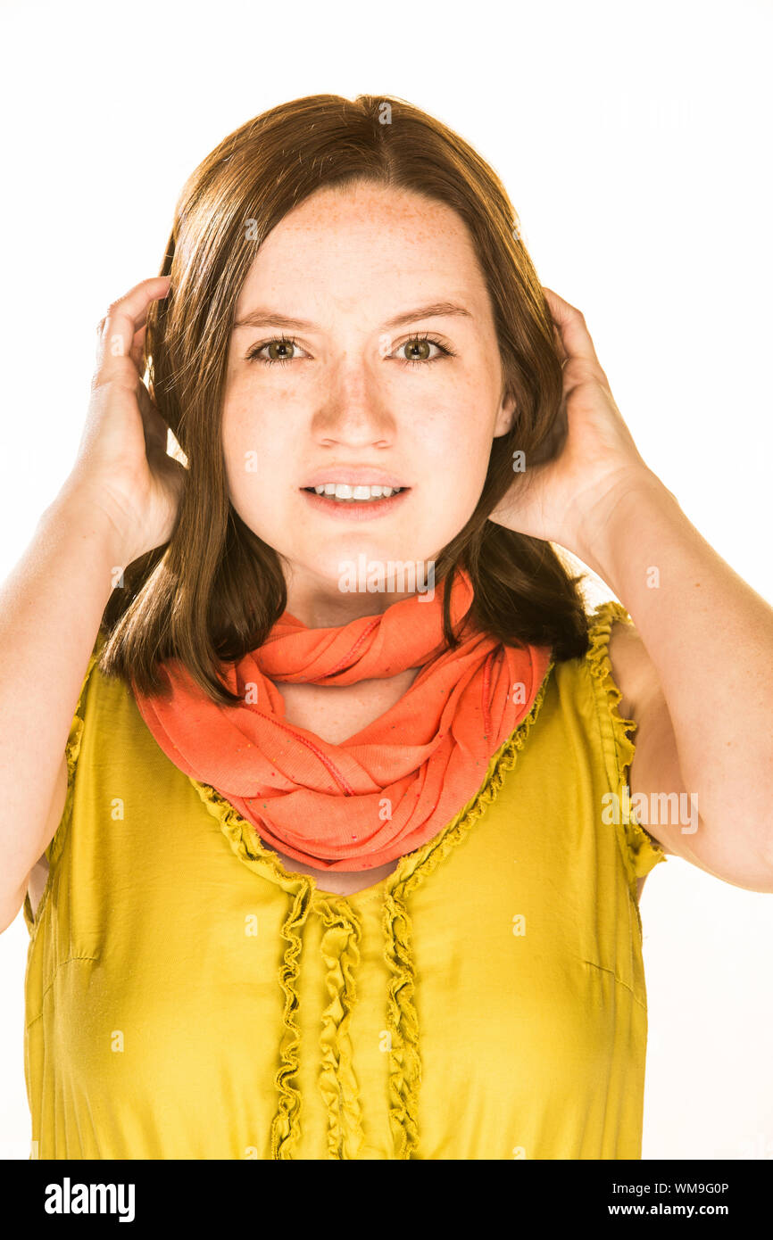Pretty girl with a stressed expression on white background Stock Photo ...