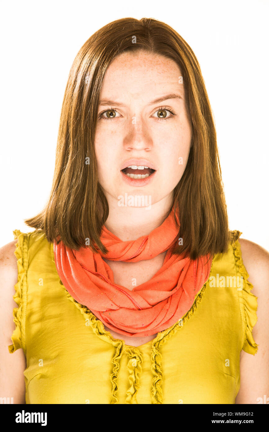 Pretty girl with an unsure expression on white background Stock Photo ... Pretty girl with an unsure expression on white background Stock Photo ...