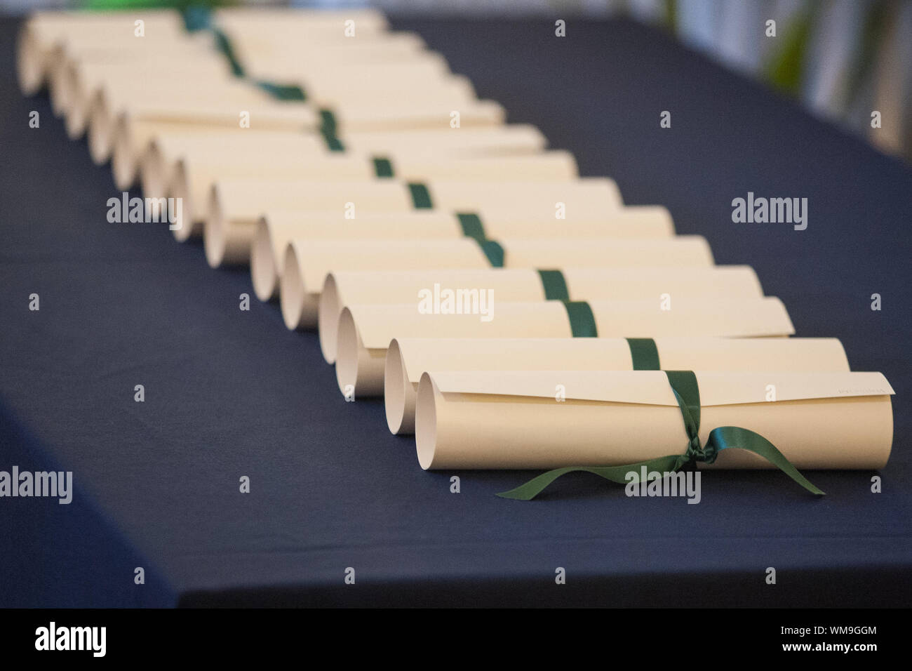 Graduation diplomas hi-res stock photography and images - Alamy