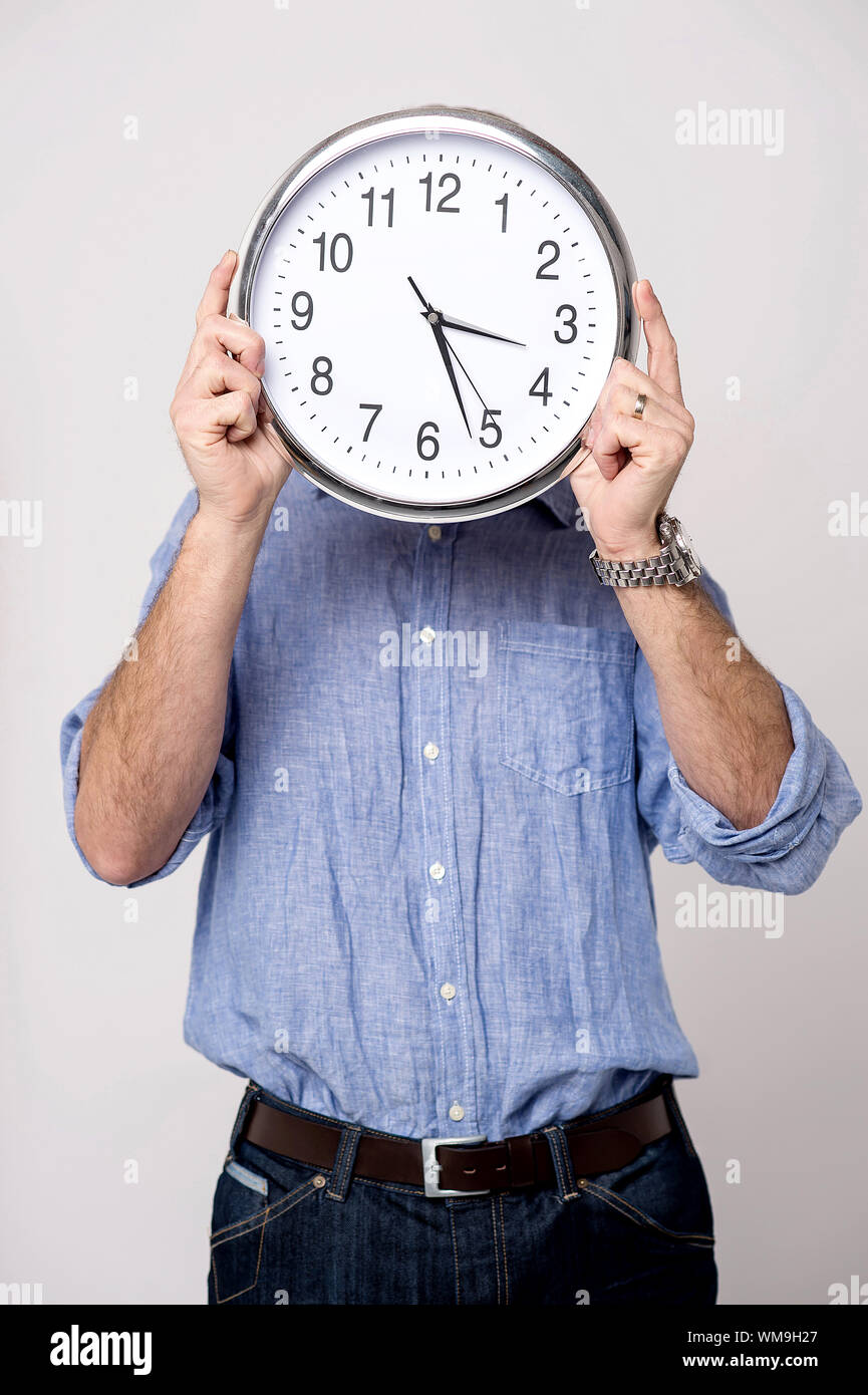 Isolated Man Hiding Face With Clock High Resolution Stock Photography ...