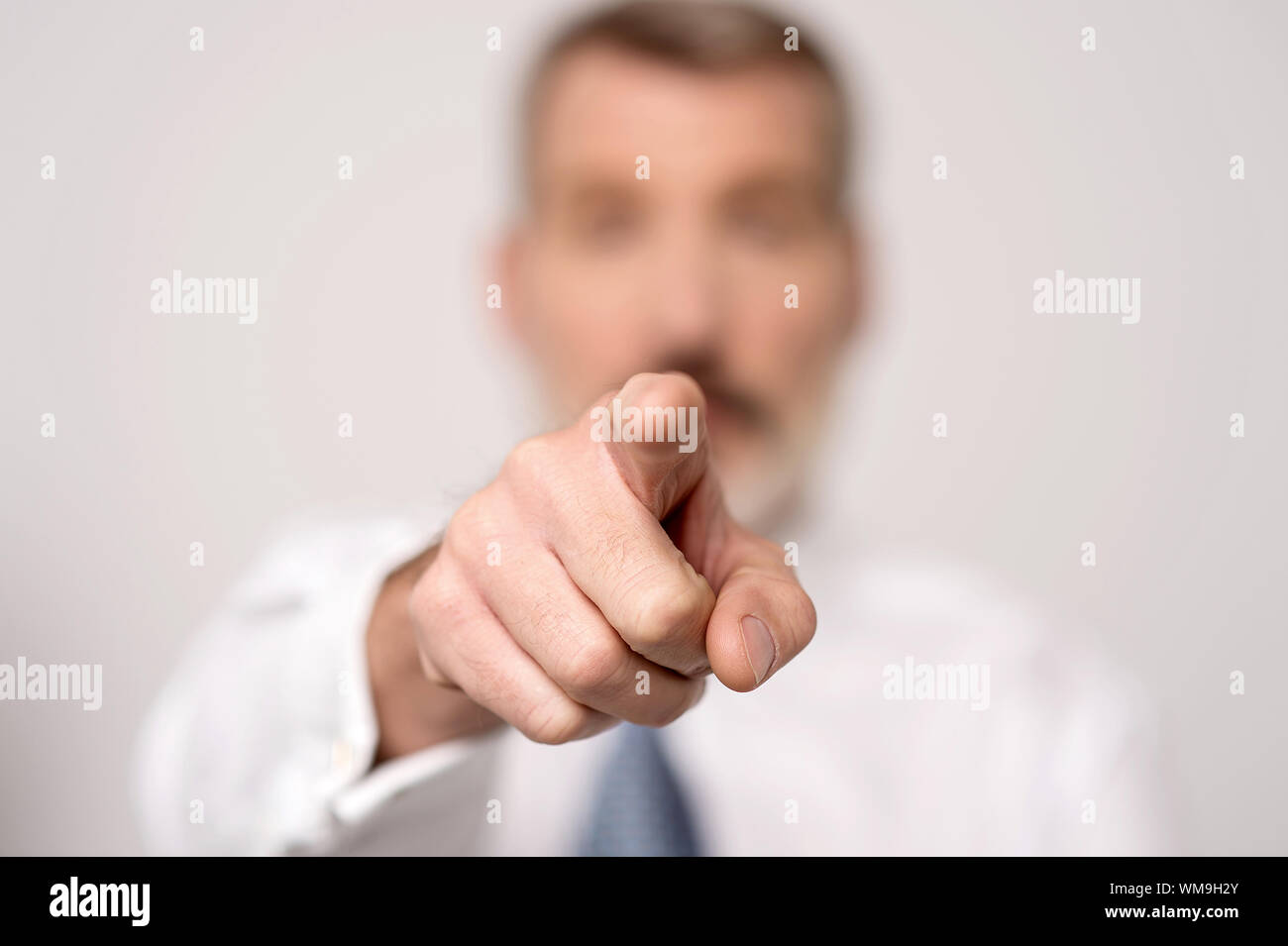 Male pointing his finger towards camera Stock Photo - Alamy
