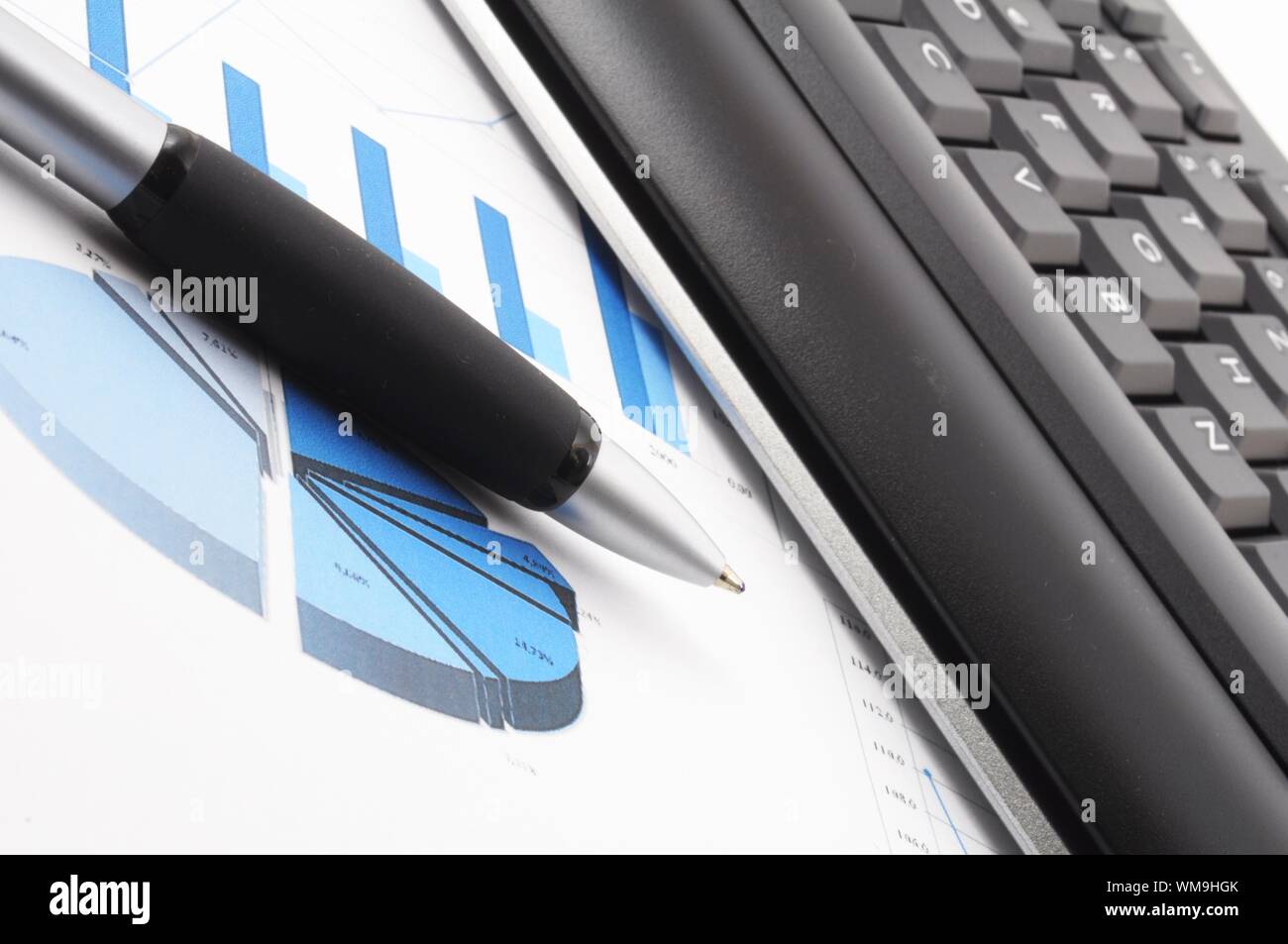 paperwork in office and computer keyboard showing success Stock Photo ...