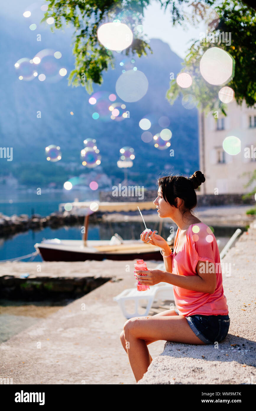 Blowing water bubble hi-res stock photography and images - Alamy