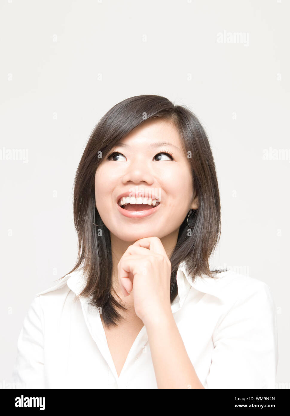 Young girl having thought Stock Photo - Alamy