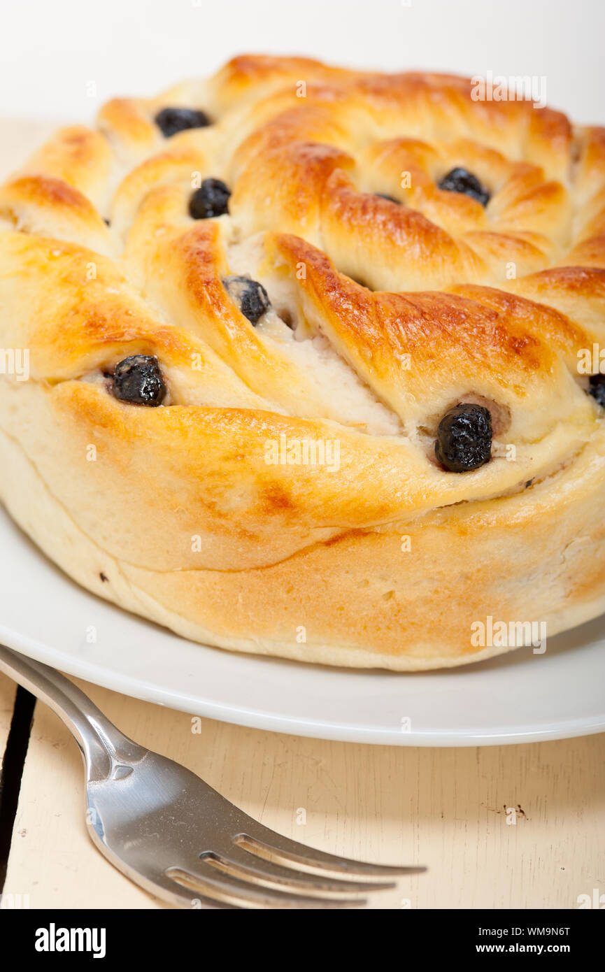 fresh home baked blueberry bread cake dessert over white wood table ...