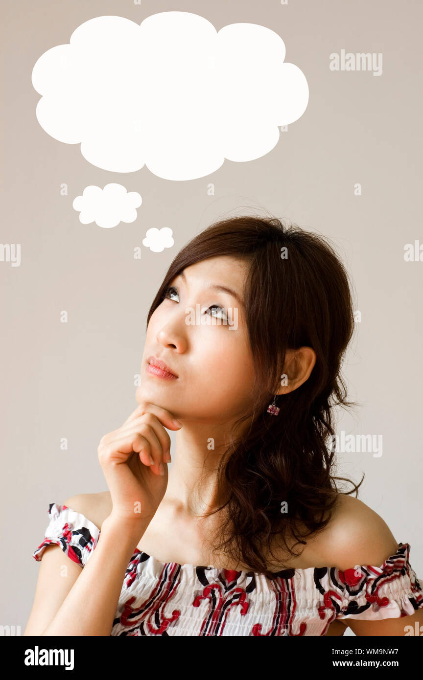 young girl having a thought balloon Stock Photo - Alamy