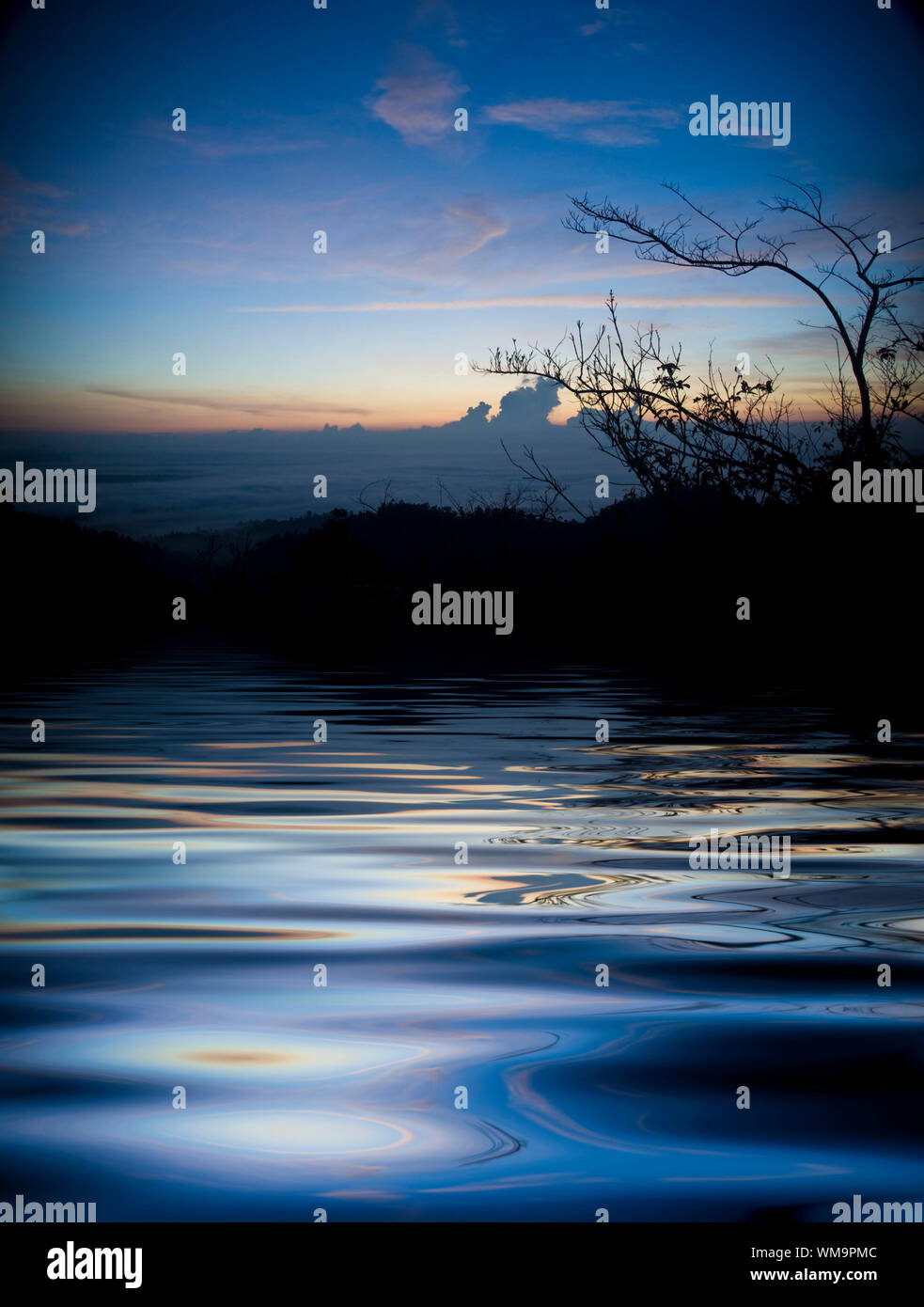 Early evening blue sky over a lake hi-res stock photography and images ...