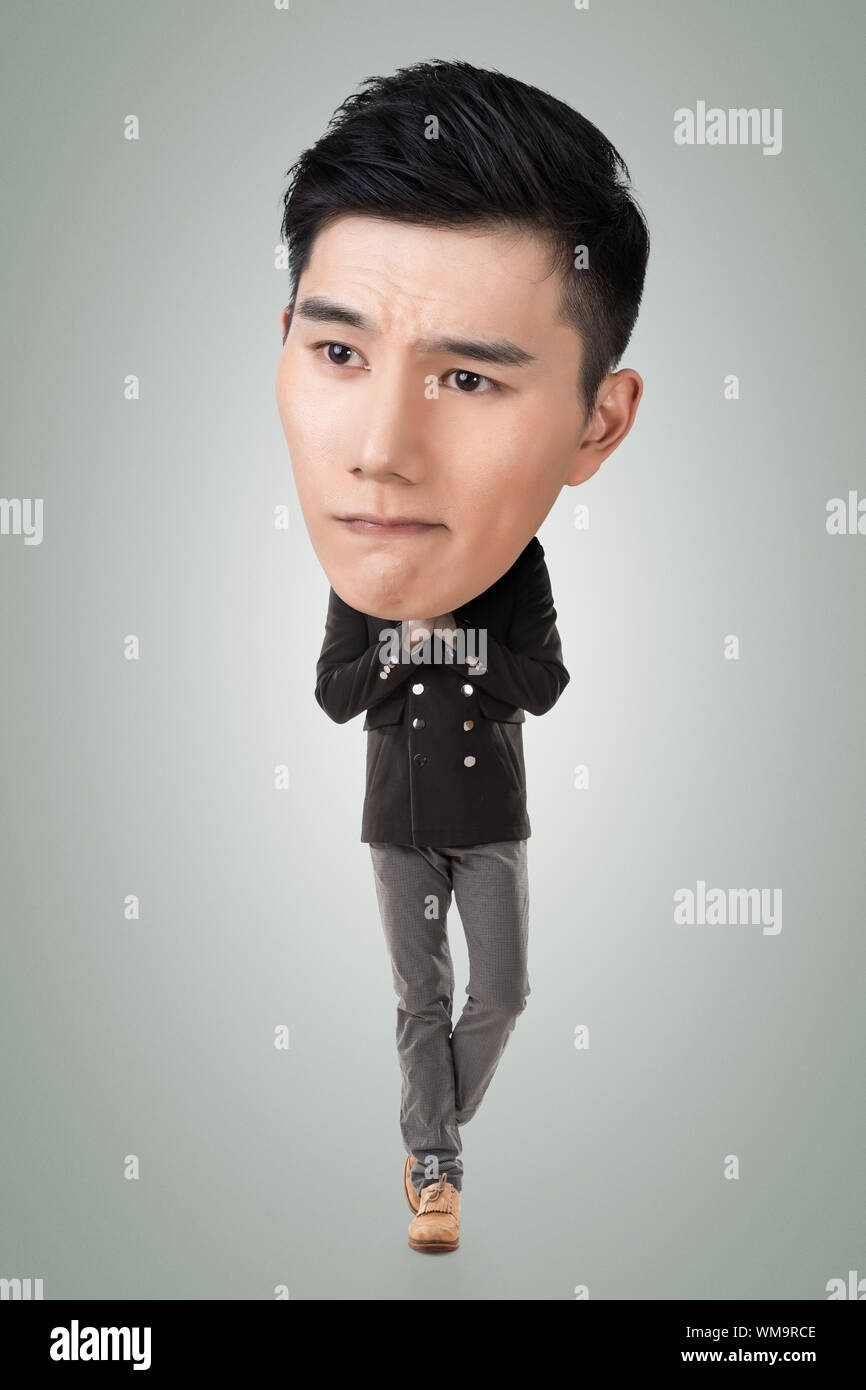 Funny Asian big head man, full length portrait Stock Photo - Alamy