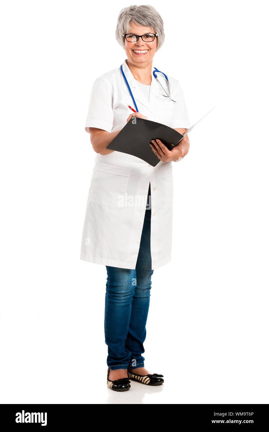 Happy old female doctor holding a folder, isolated on white Stock Photo ...