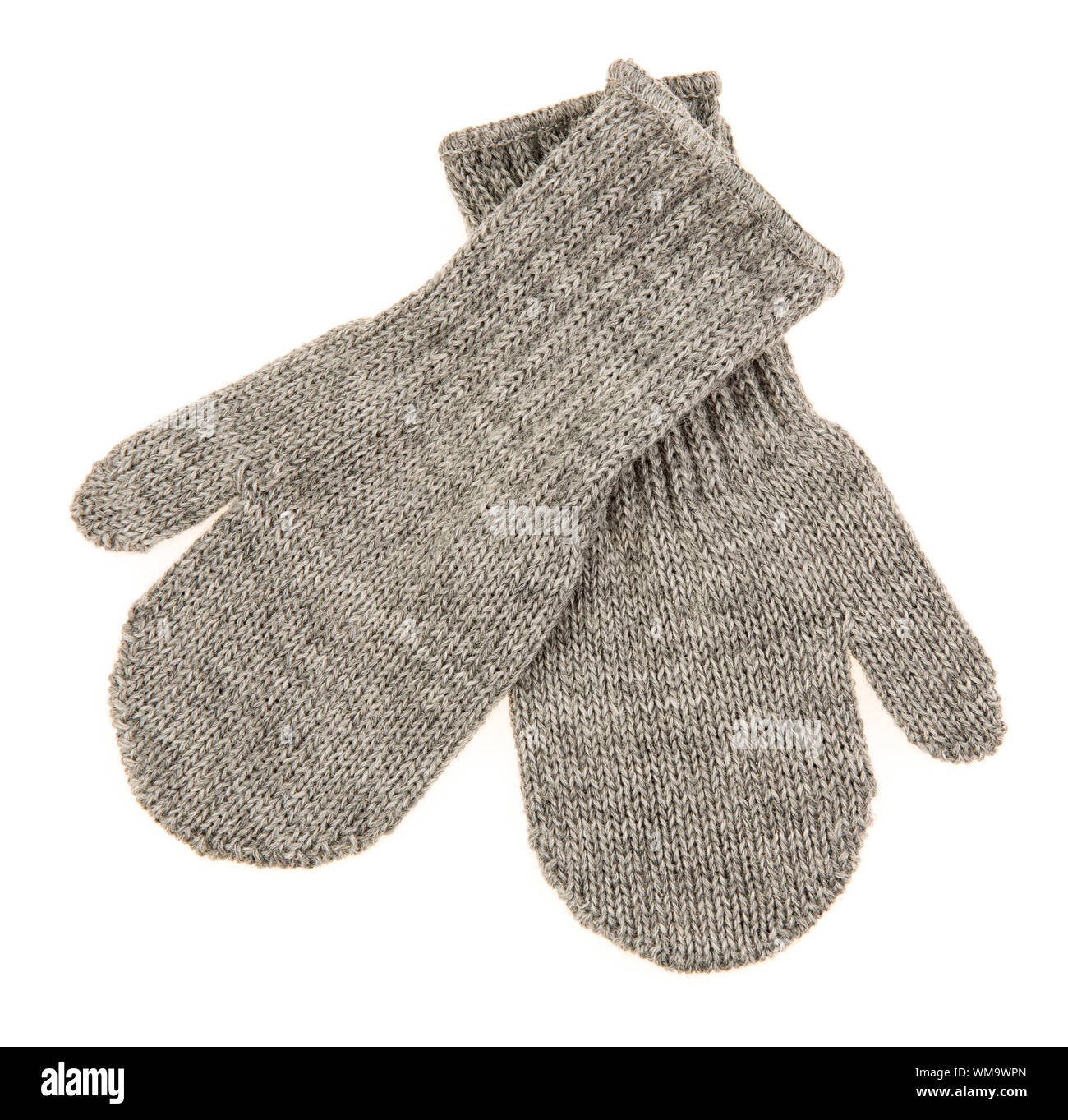 Children's autumn-winter mittens on a white background Stock Photo - Alamy