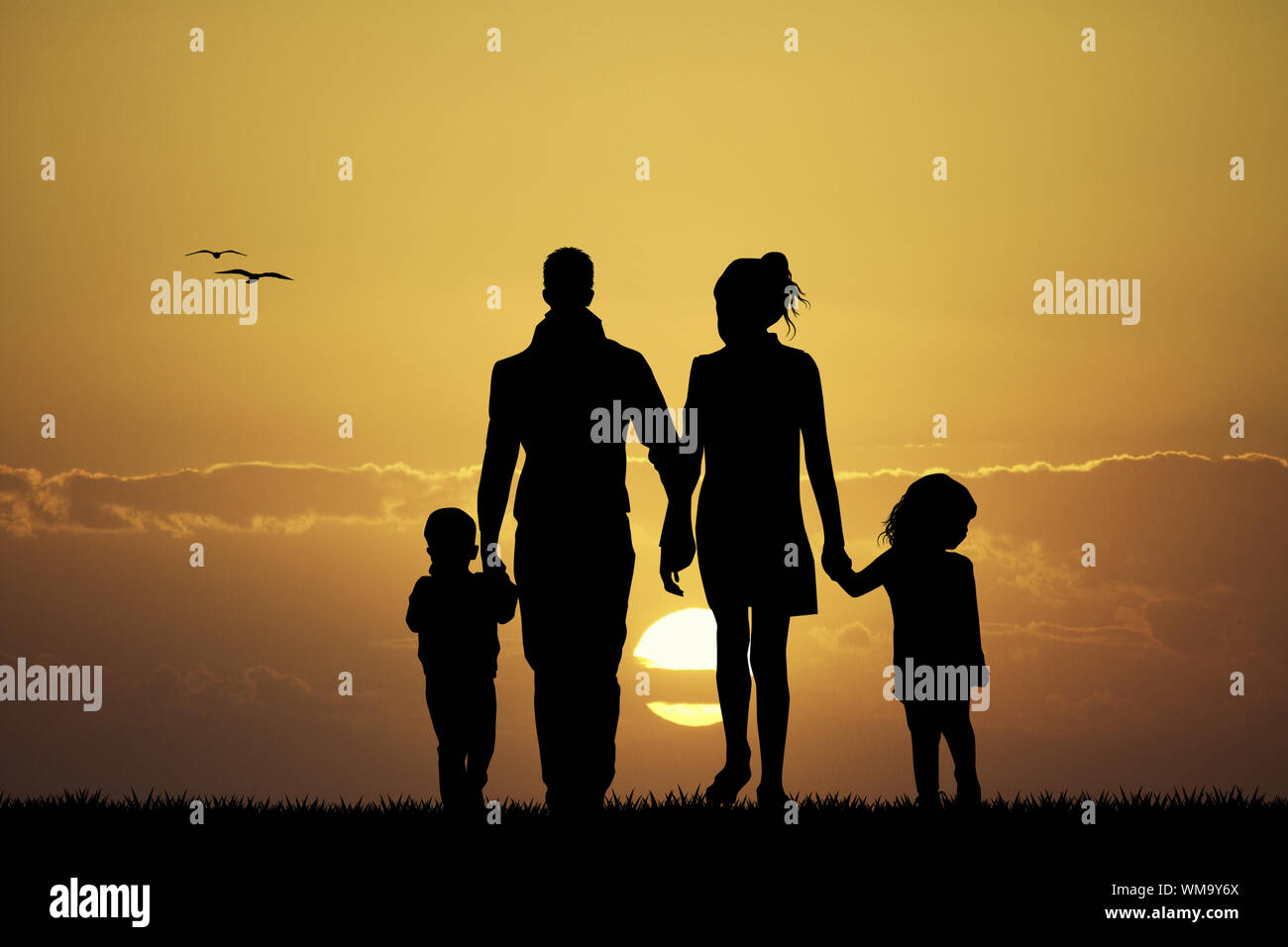 happy family at sunset Stock Photo - Alamy