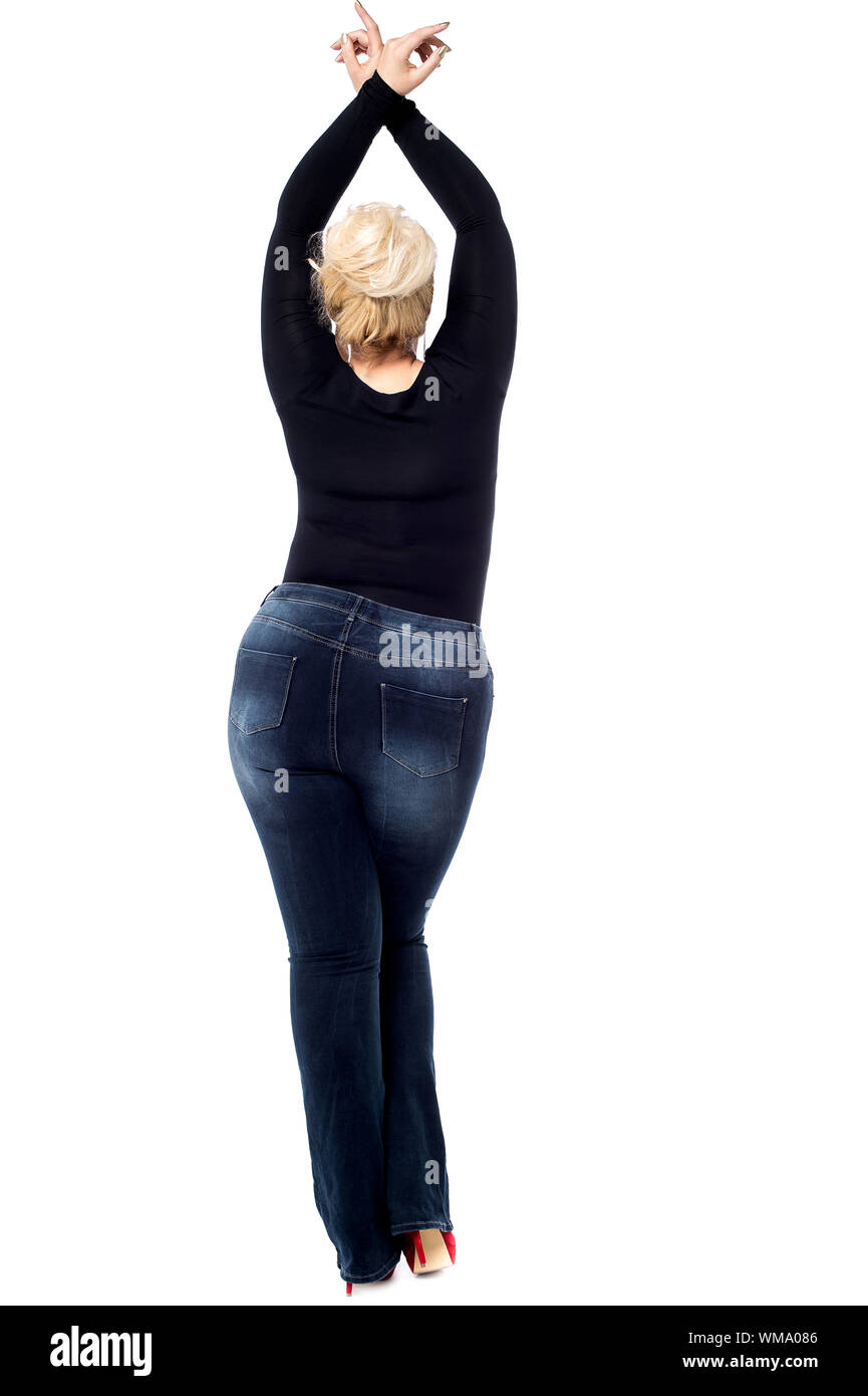 Rear view of a middle aged woman Stock Photo - Alamy