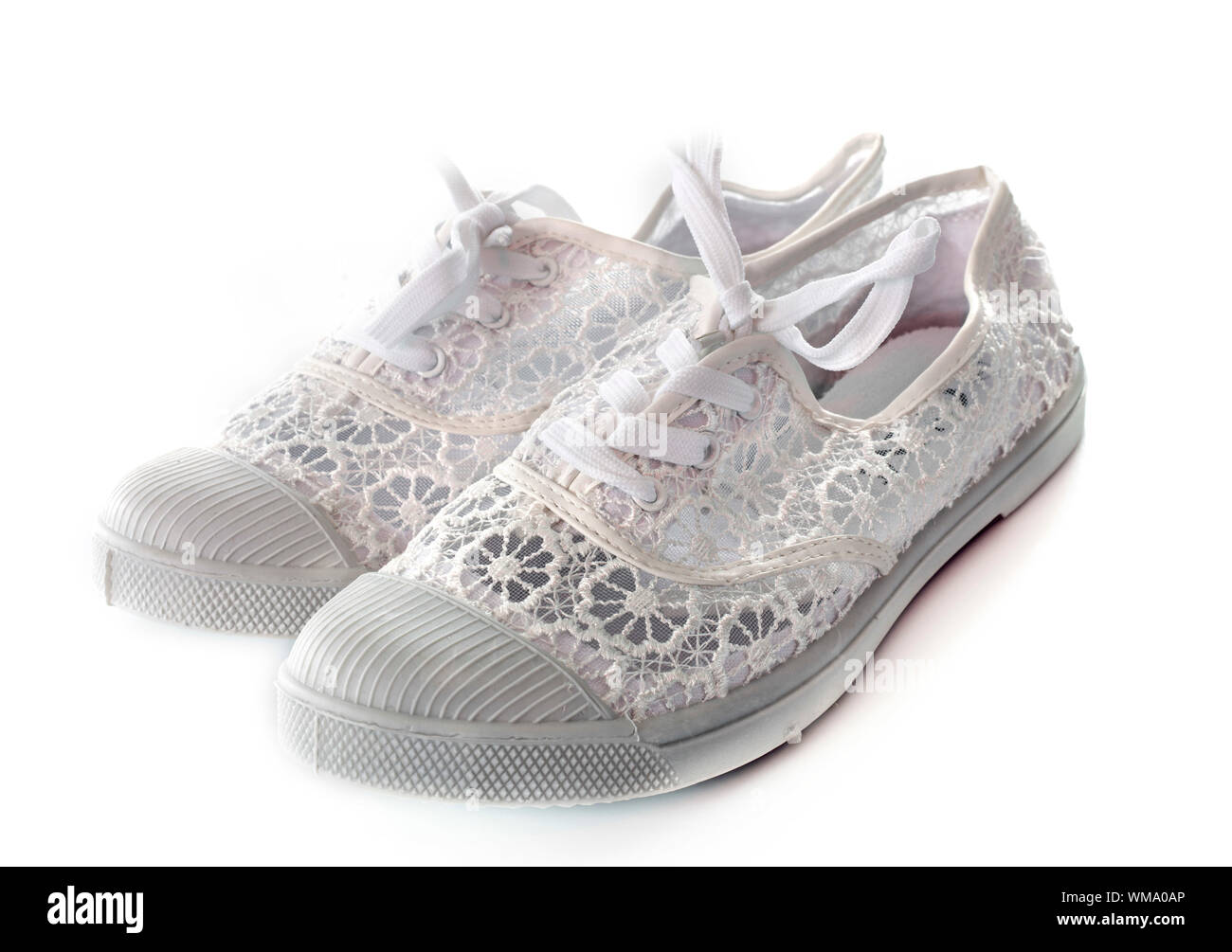 white shoes in front of white background Stock Photo - Alamy