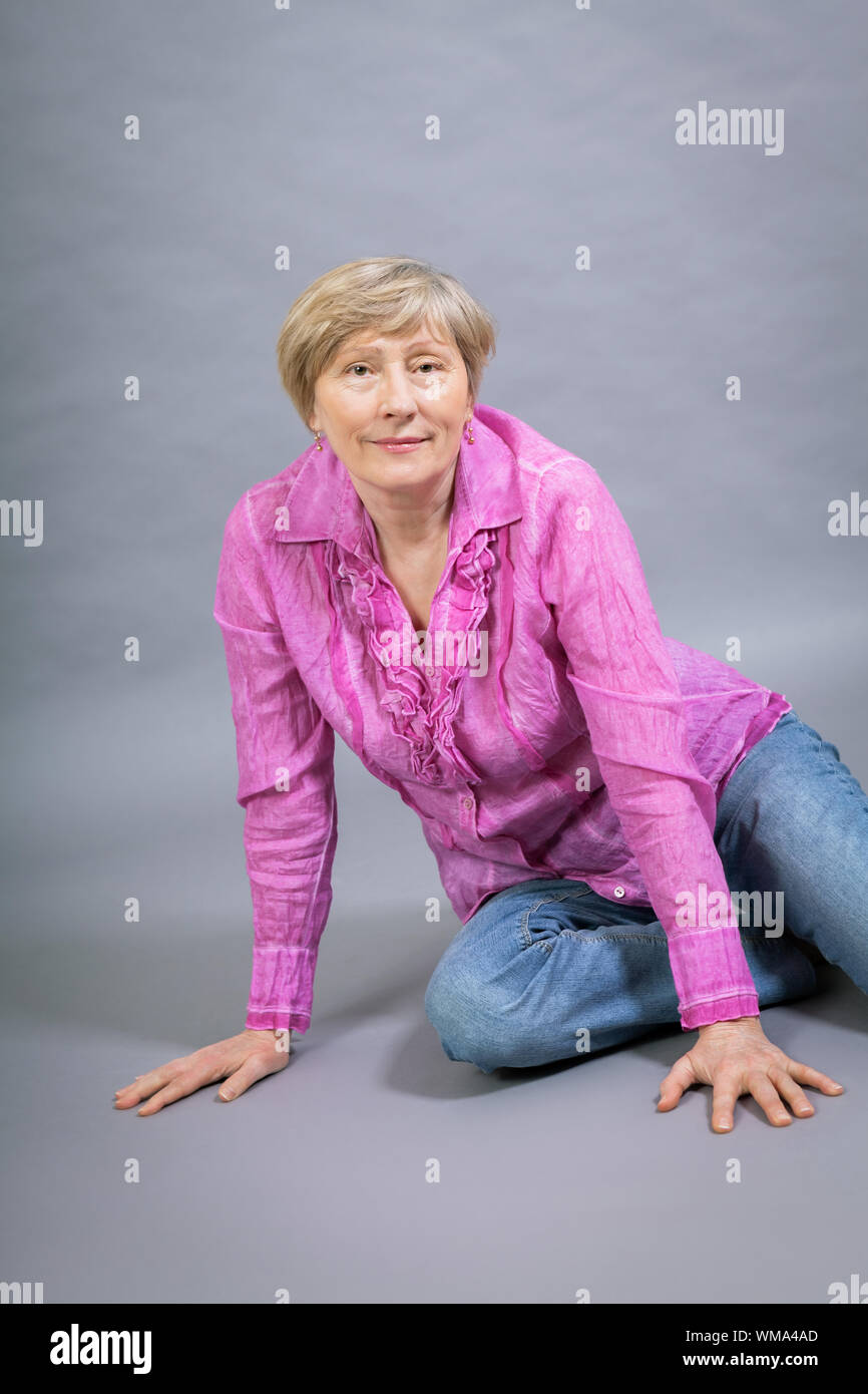 Beautiful old lady sitting hi-res stock photography and images - Alamy