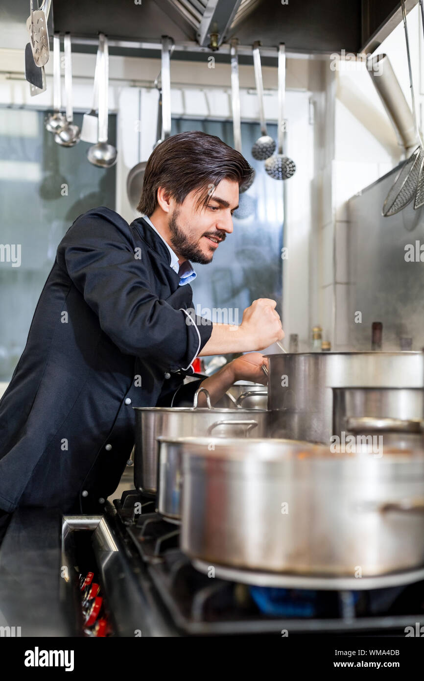 Huge metal cooking pot hi-res stock photography and images - Alamy