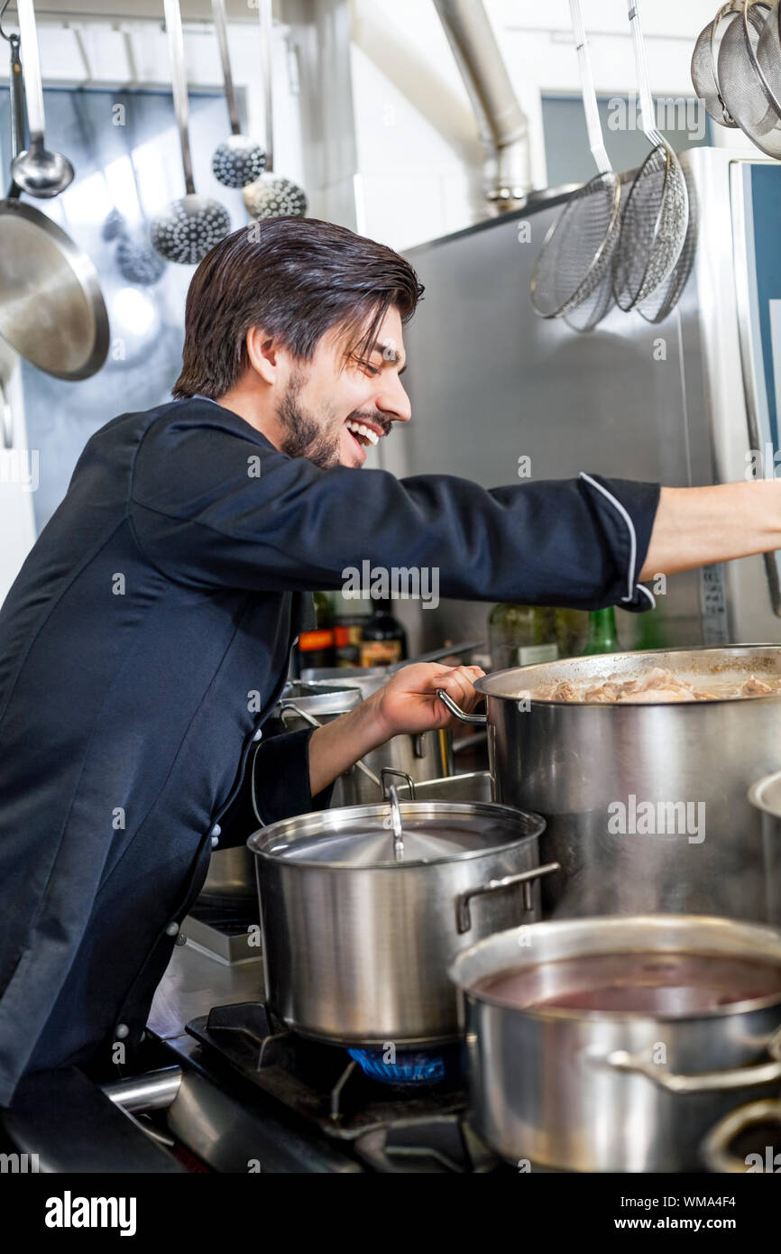Huge metal cooking pot hi-res stock photography and images - Alamy