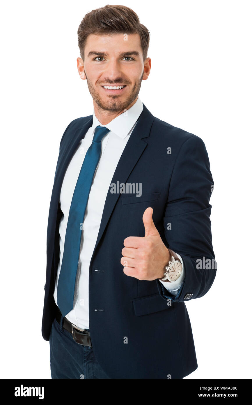 Stylish successful handsome young businessman standing in a relaxed ...
