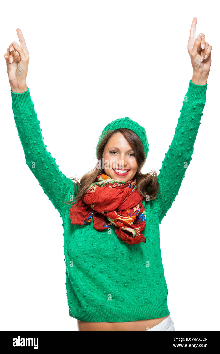 Excited exuberant pretty young woman cheering and smiling and raising ...