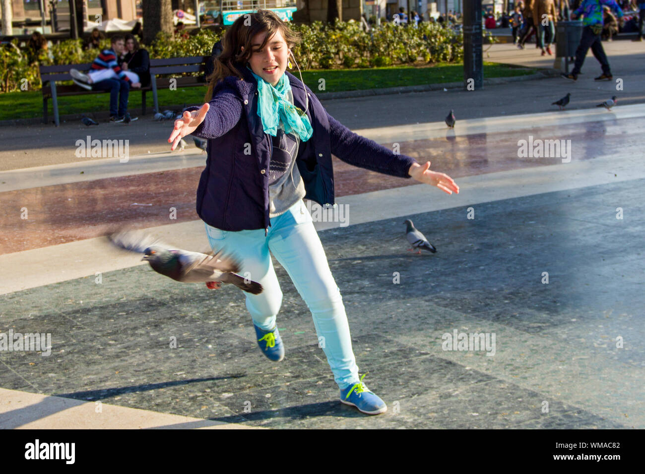 Girl and pigeon hi-res stock photography and images - Alamy