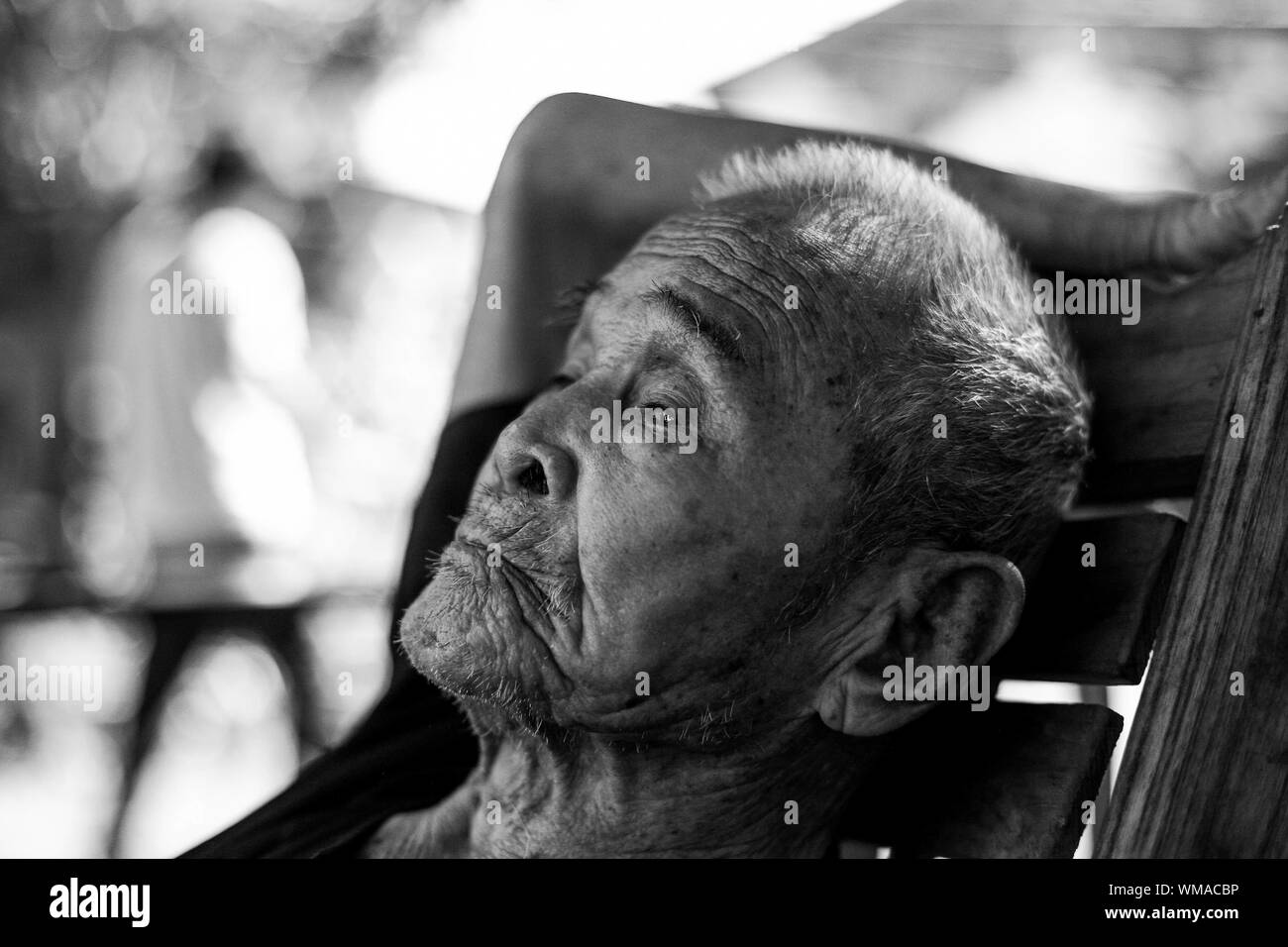 Old man sitting on chair hi-res stock photography and images - Alamy